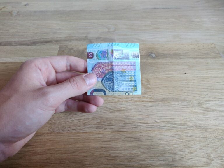 Magic trick with pen and dollar bill explained (with images)