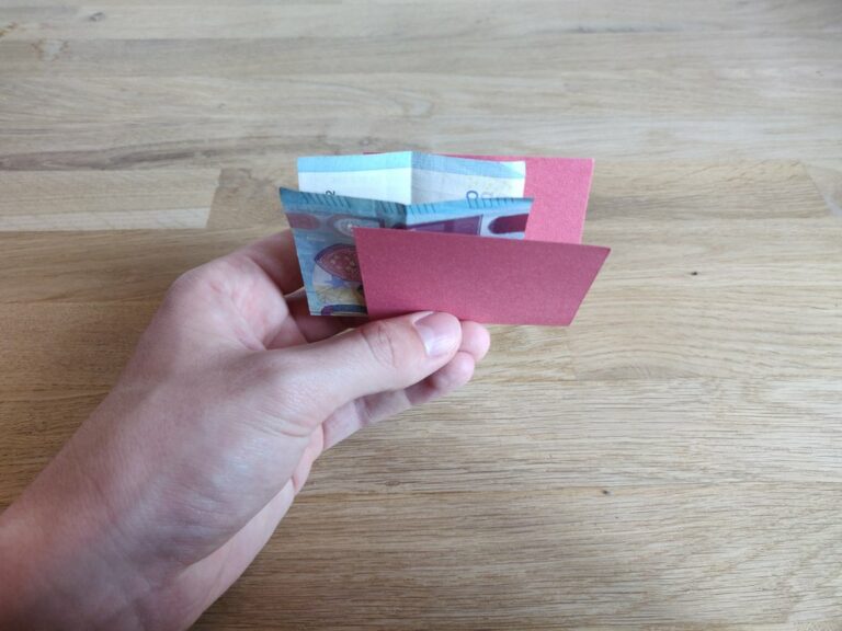 Magic trick with pen and dollar bill explained (with images)