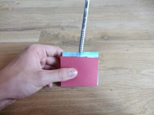 Magic trick with pen and dollar bill explained (with images)