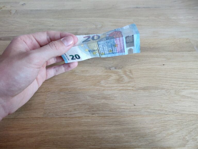 Magic trick with pen and dollar bill explained (with images)