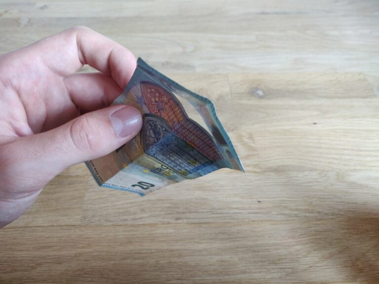 Magic trick with pen and dollar bill explained (with images)