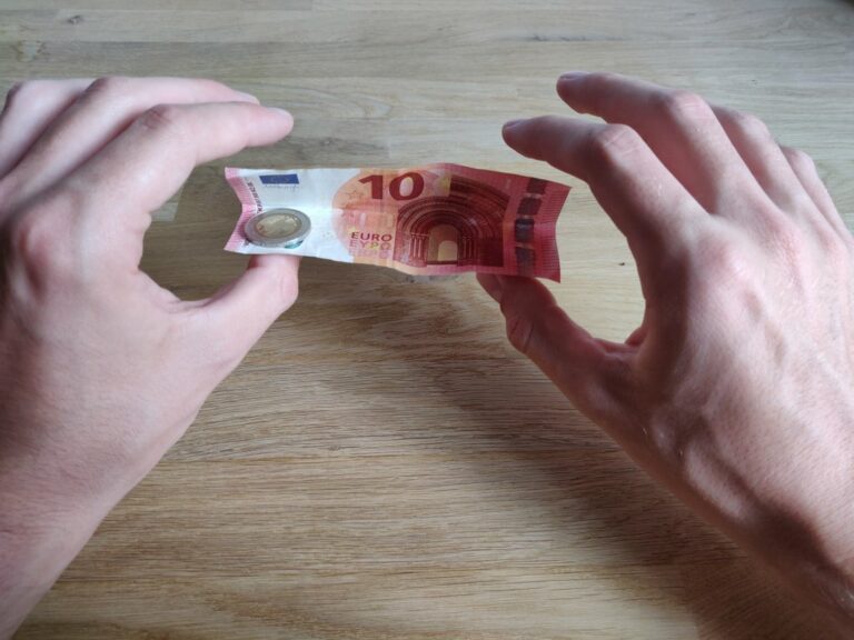 “Floating dollar bill” trick revealed: How to levitate money
