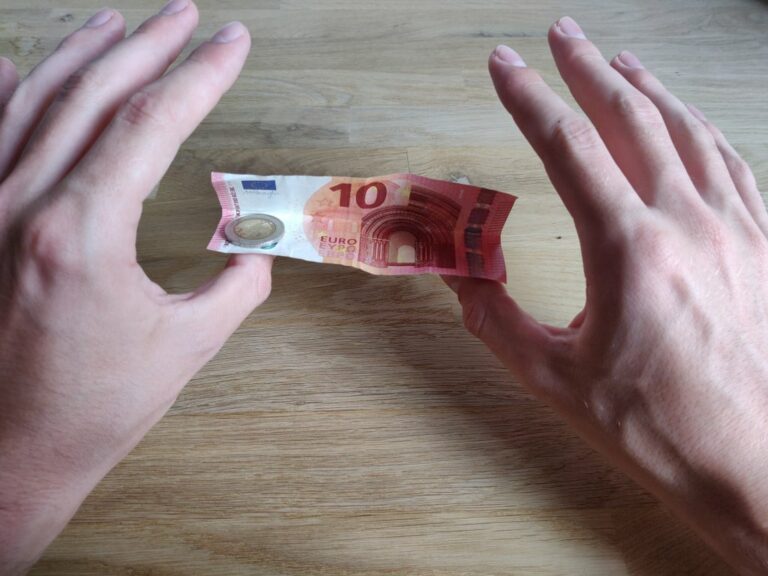 “Floating dollar bill” trick revealed: How to levitate money