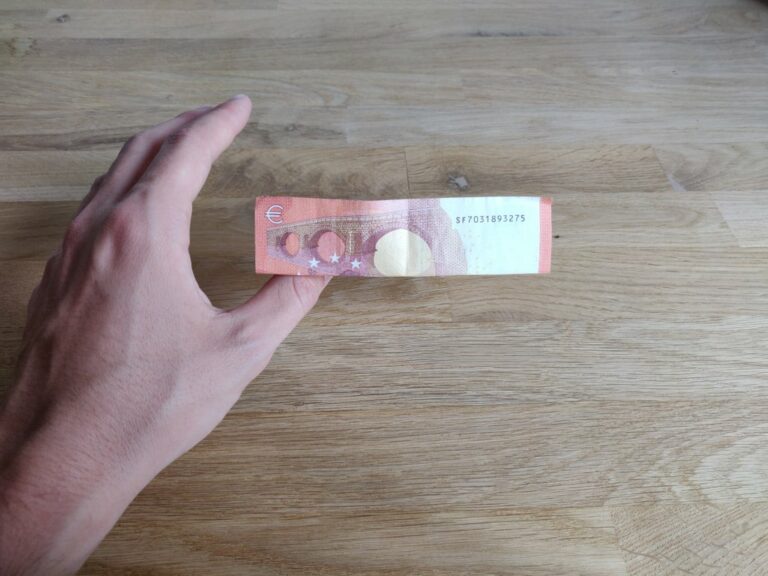 “Floating dollar bill” trick revealed: How to levitate money